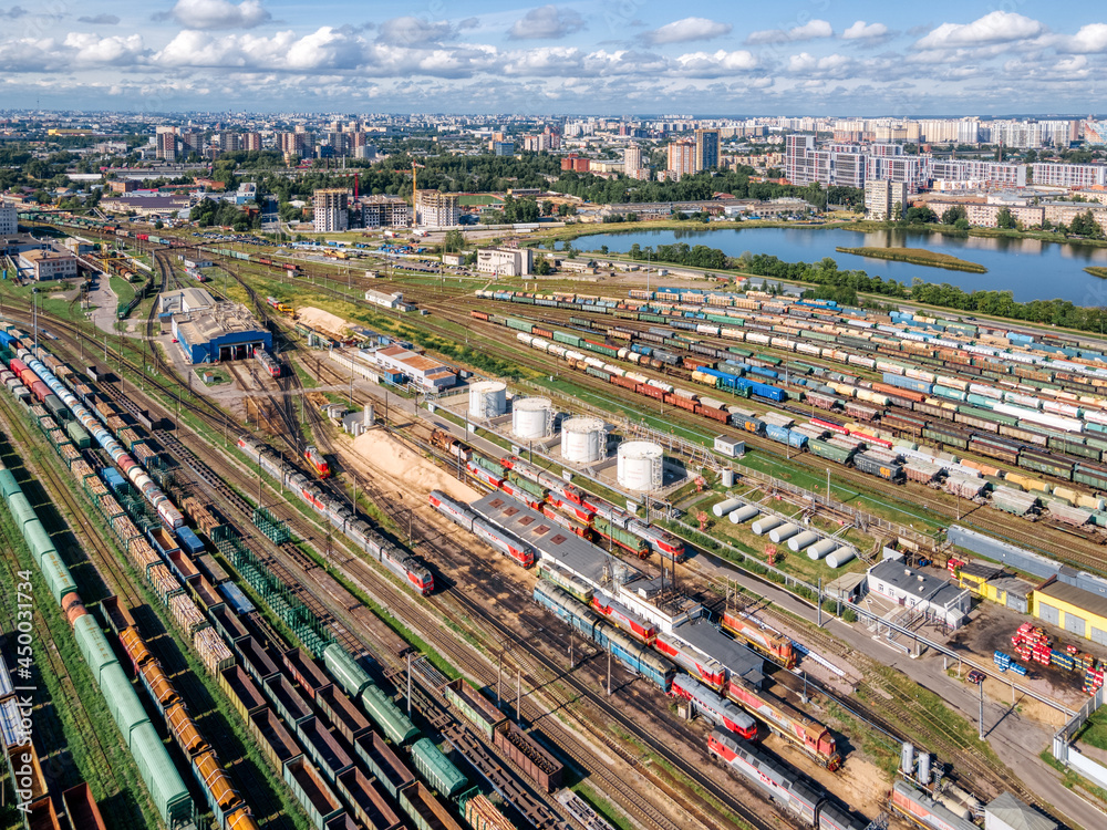 Aerial photo of railway terminal. On the railroad lots of various ...