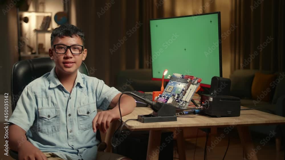 It Asian Boy Is Working With Desktop Computer And Mainboard In Home ...