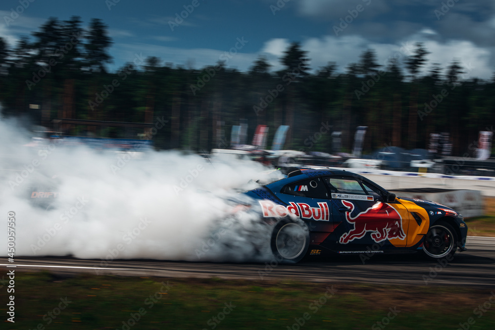 2020 BMW M4 Red Bull car going fast with drift Stock Photo | Adobe Stock