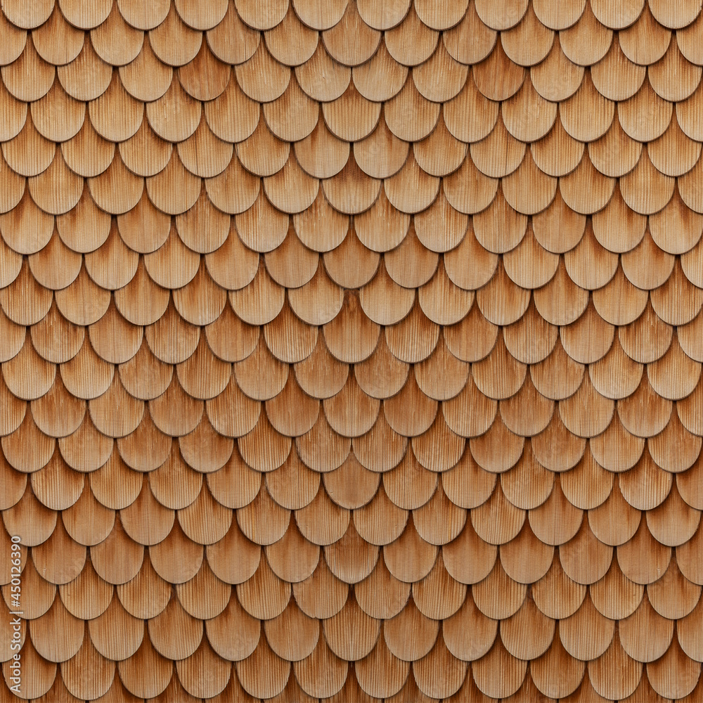 Traditional ecological consistent cladding of a wall with brown wooden ...