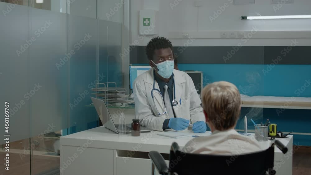 Invalid elder patient having appointment with doctor in healthcare ...