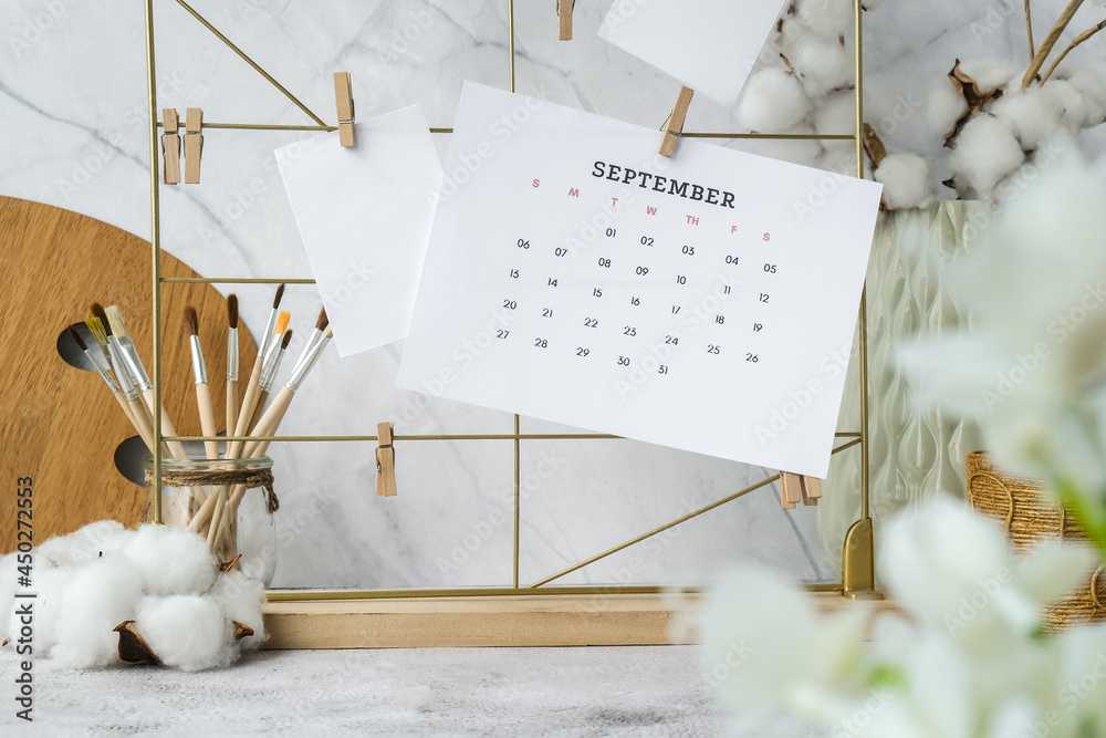 SEPTEMBER CALENDAR cards and posters mock ups on grid board. Copy space ...