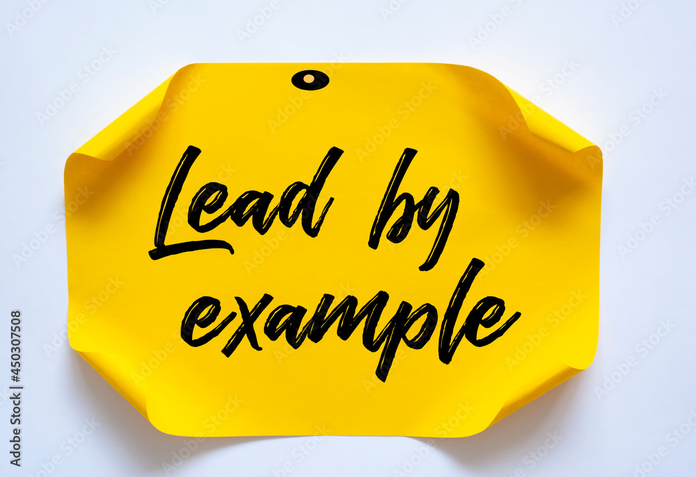 Text lead by example on the short note texture background Stock Photo ...