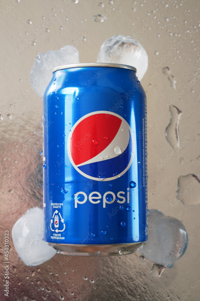 Pepsi Can and ice pieces. carbonated soft drink produced and ...