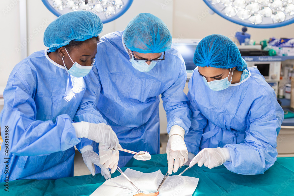 Doctor and assistant nurse operating for help patient from dangerous ...