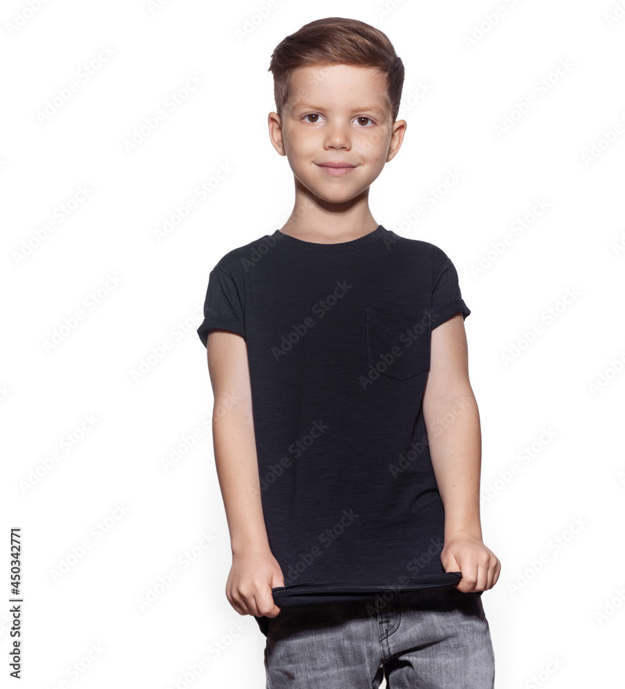 Cool happy little boy wearing blue dark t-shirt and jeans posing ...