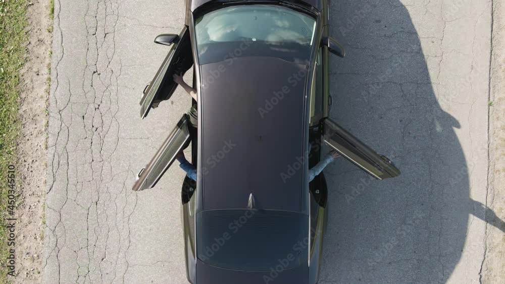 Three doors of a passenger car open in turn, top view. Bird's-eye view ...