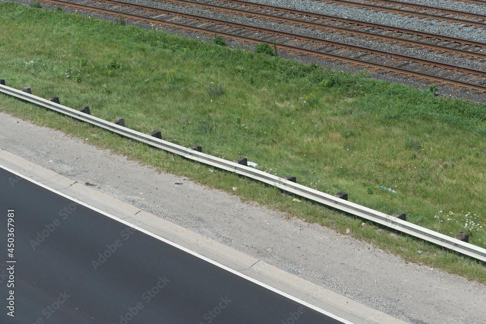 rail and road with grassy median space Stock Photo | Adobe Stock