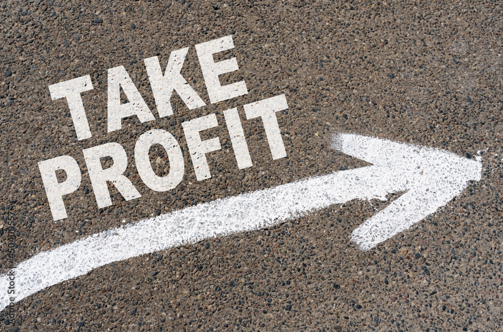 On the asphalt road markings an arrow with the inscription - TAKE ...