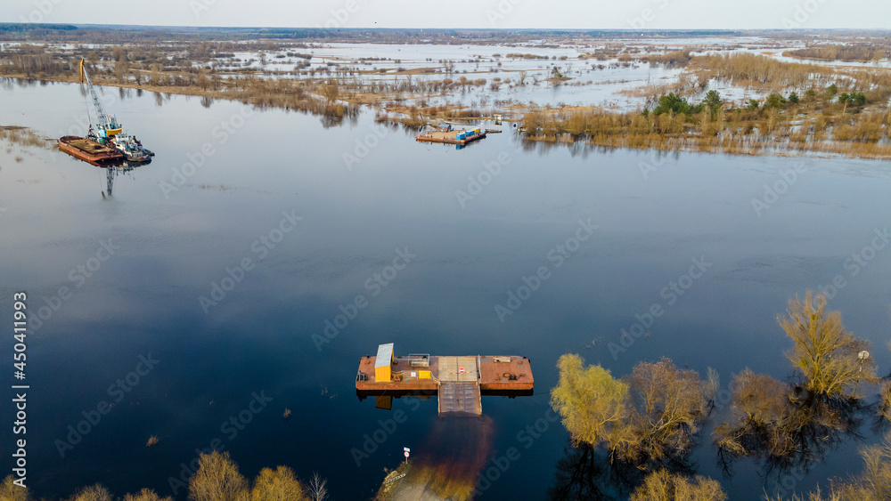 Ancient, manual crossing over the river. The car is transported across ...