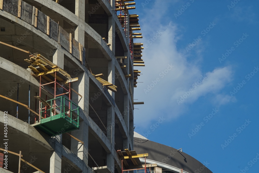 Photo of a concrete box of a building under construction. The ...