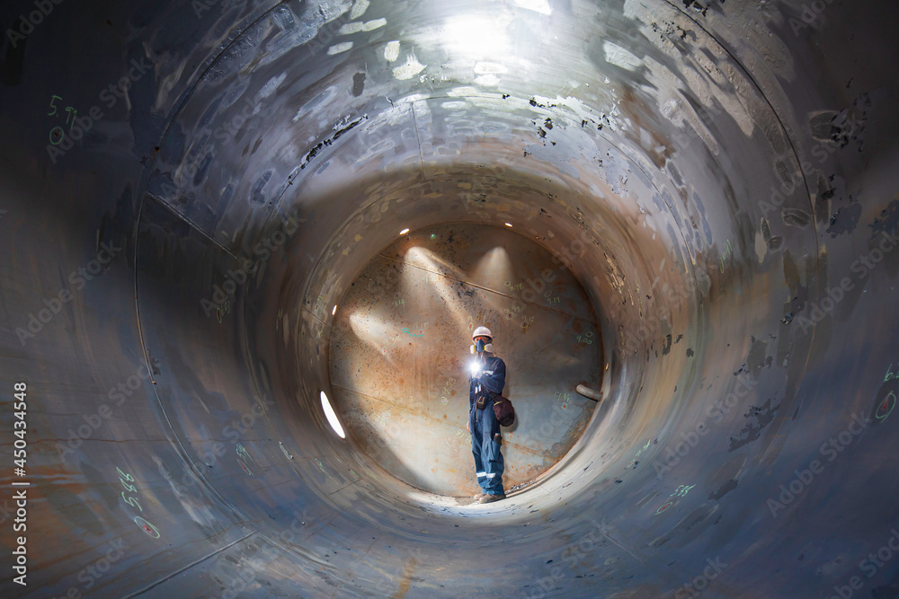 Working male inspection weld underground of equipment tunnel Stock ...