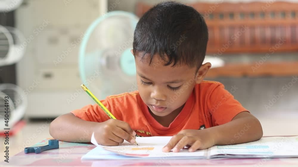 Cute child boy studying and thinking at the home. Cute child boy artist ...