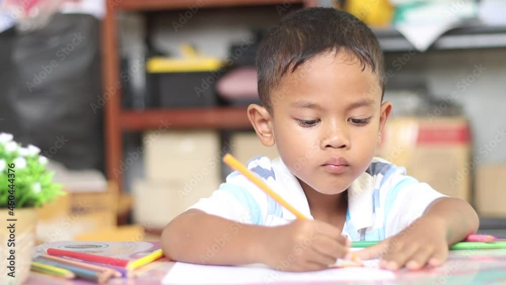 Cute child boy studying and thinking at the home. Cute child boy artist ...