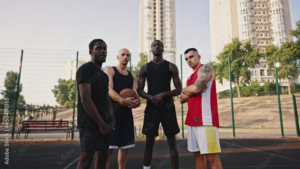 Basketball team. Zoom out portrait of a multiethnic team of athletes on ...