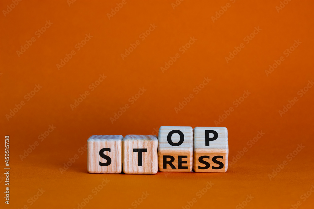 Stop stress and be health symbol. Turned wooden cubes and changed words ...
