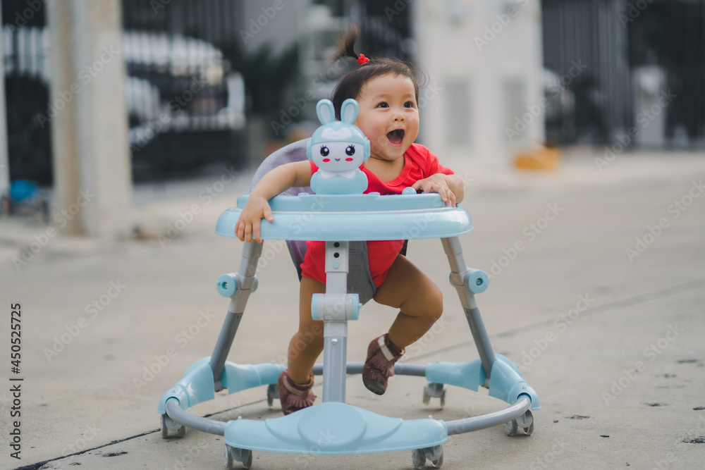 child happy time running in outdoor at road village to practice balance ...