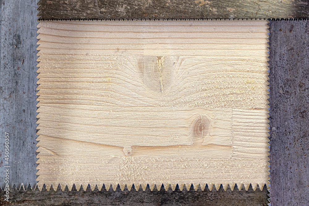 The saw blades for wood are laid in a rectangle with the teeth inward ...