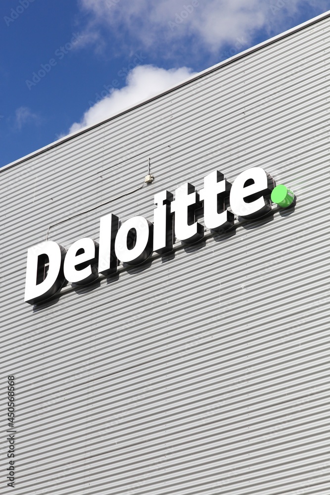 Aalborg, Denmark - July 13, 2017: Deloitte logo on a wall. Deloitte is ...