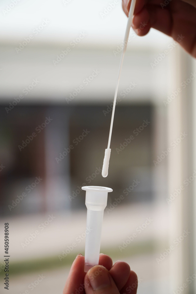 Positive test result by using rapid test for COVID-19, quick fast ...