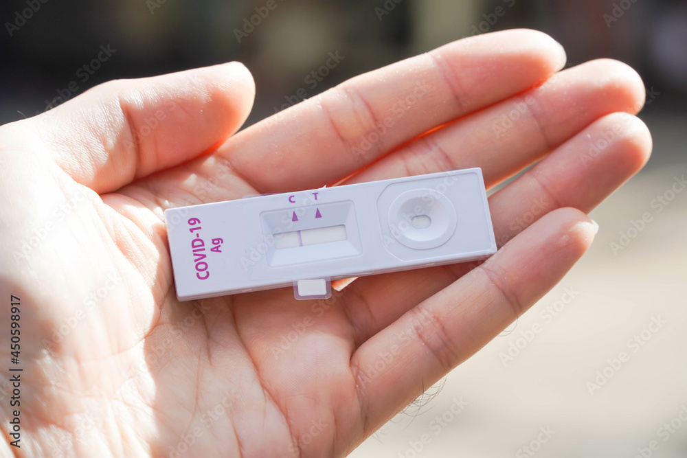 Positive test result by using rapid test for COVID-19, quick fast ...