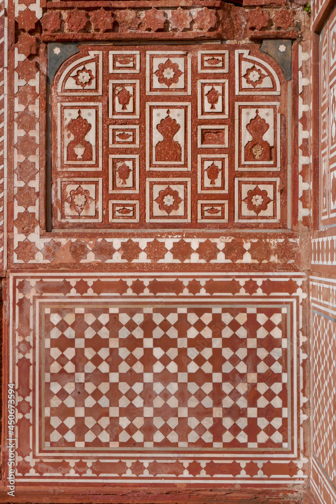 Detail of red sandstone panel with white marble inlay on exterior of ...