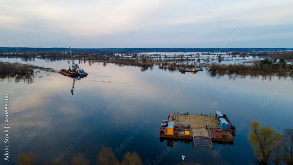 Ancient, manual crossing over the river. The car is transported across ...