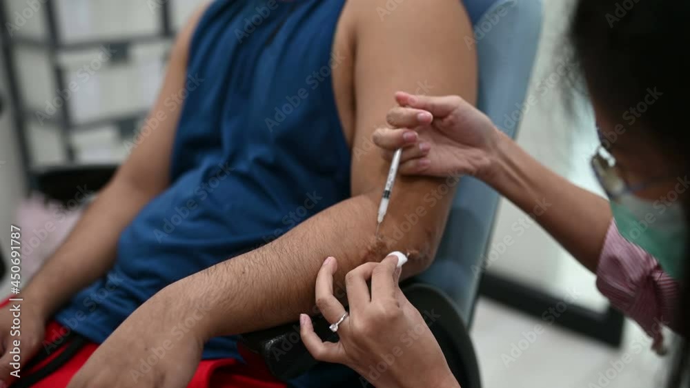 Asian handsome man Steroid injections to soften scars Stock Video ...