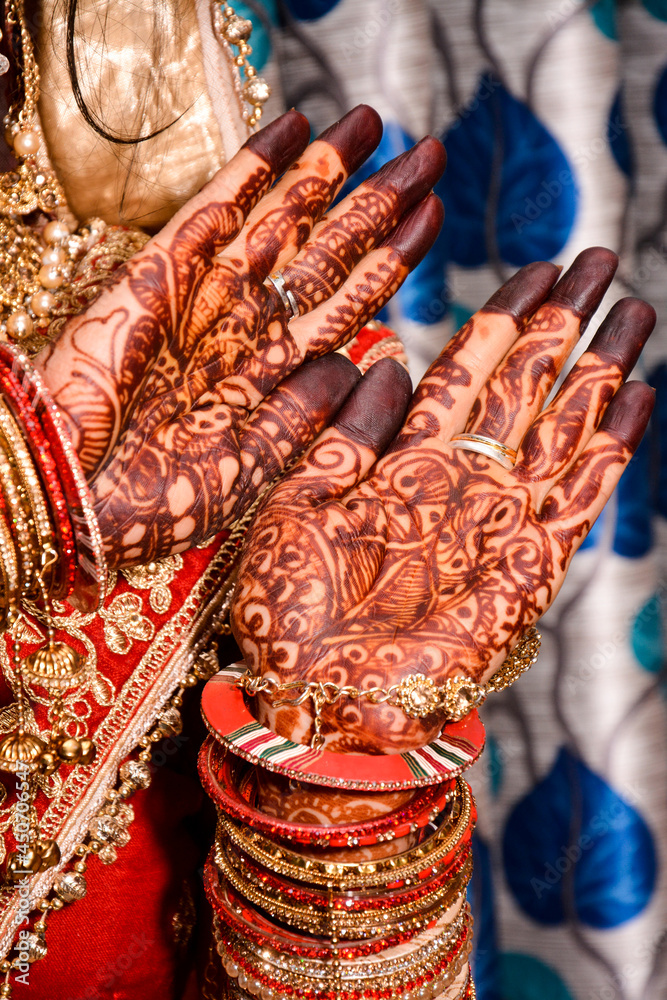Indian bride showing hands mehndi design Stock Photo | Adobe Stock