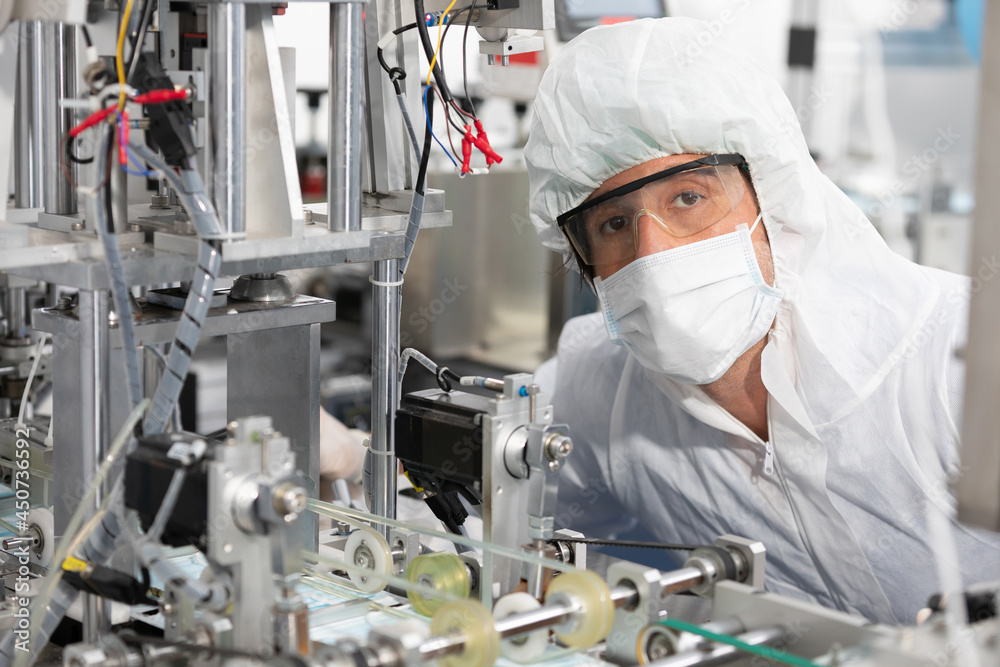 male engineers wearing personal protective equipment uniform(PPE) and ...