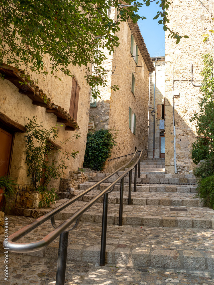 Typical provencal village narrow street in the French Riviera back ...