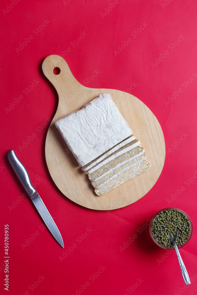 Tempe isolated on plain background. View from above. Tempe is a typical ...