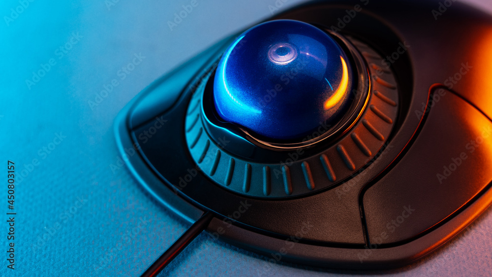 close-up Trackball Computer Mouse on a black background. Control Device ...