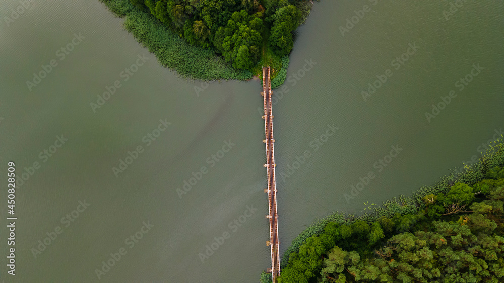 Iron steel frame construction of narrow gauge railway bridge across the ...