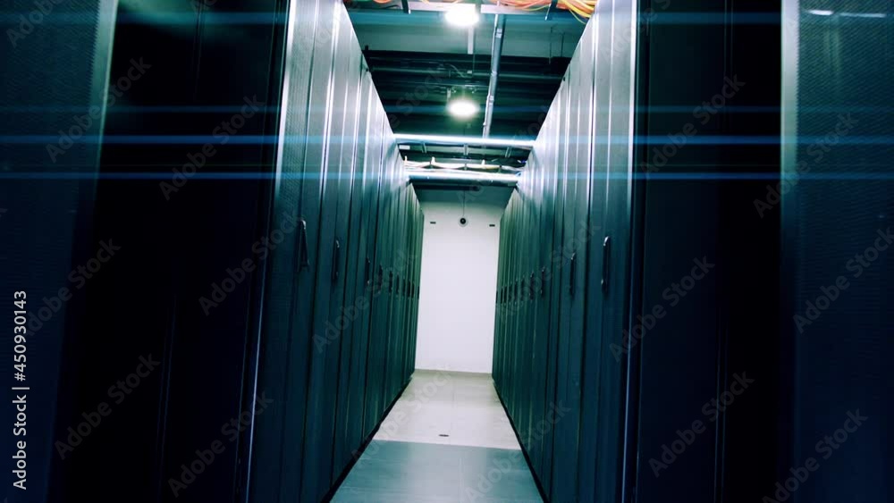 Camera moves through big working data center with server racks . Real ...