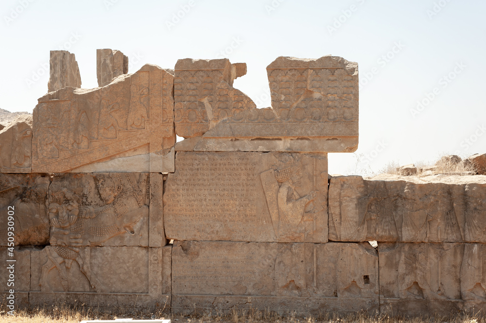 Bas relief on the wall of ruins in the Persepolis in Shiraz, Iran. The ...