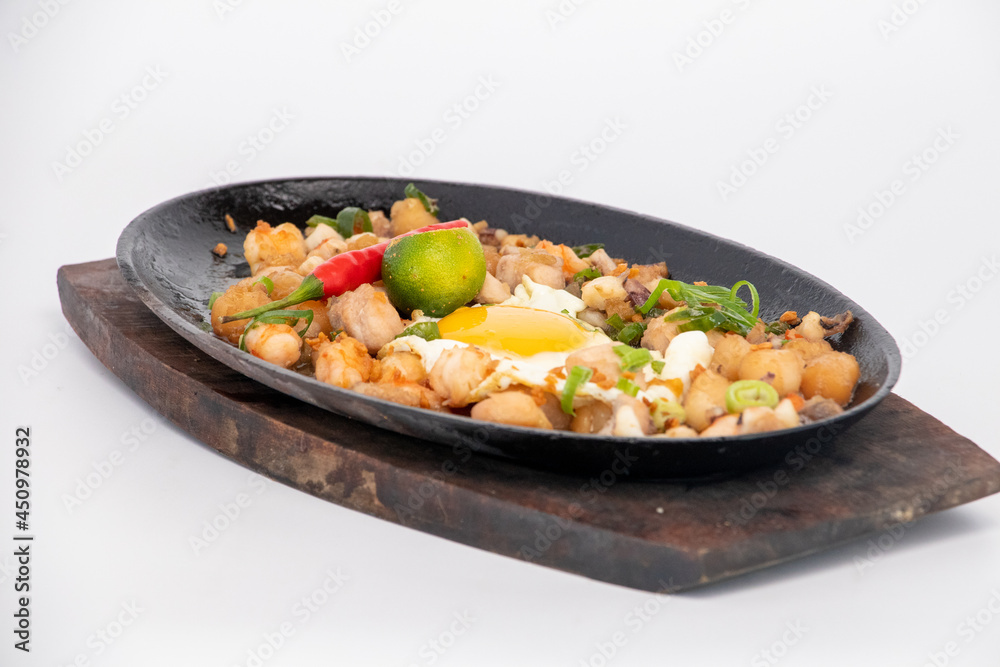 sizzling pork sisig Stock Photo | Adobe Stock
