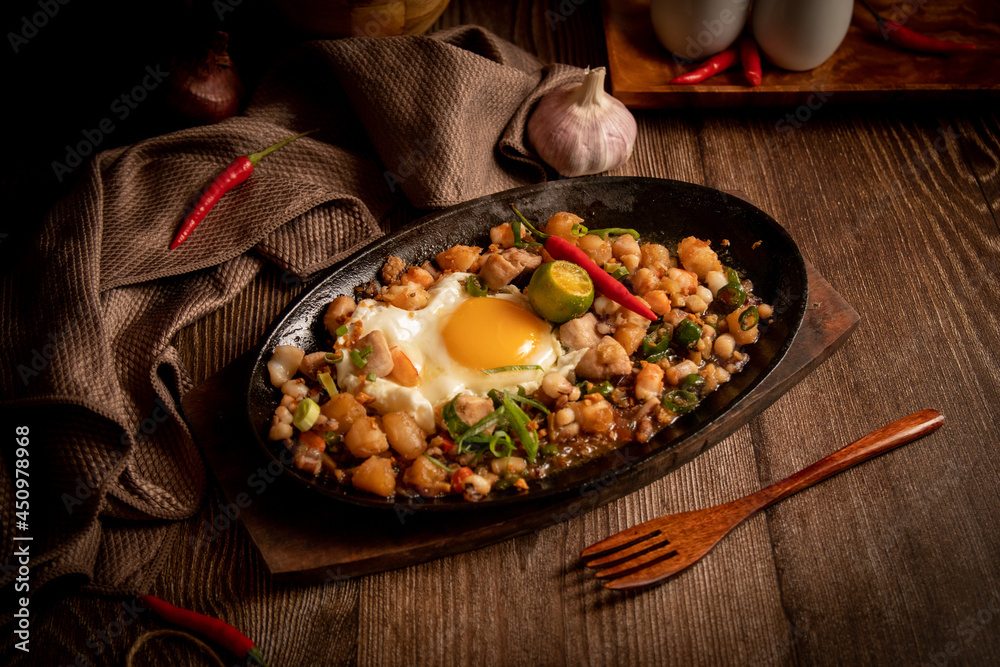 sizzling pork sisig Stock Photo | Adobe Stock