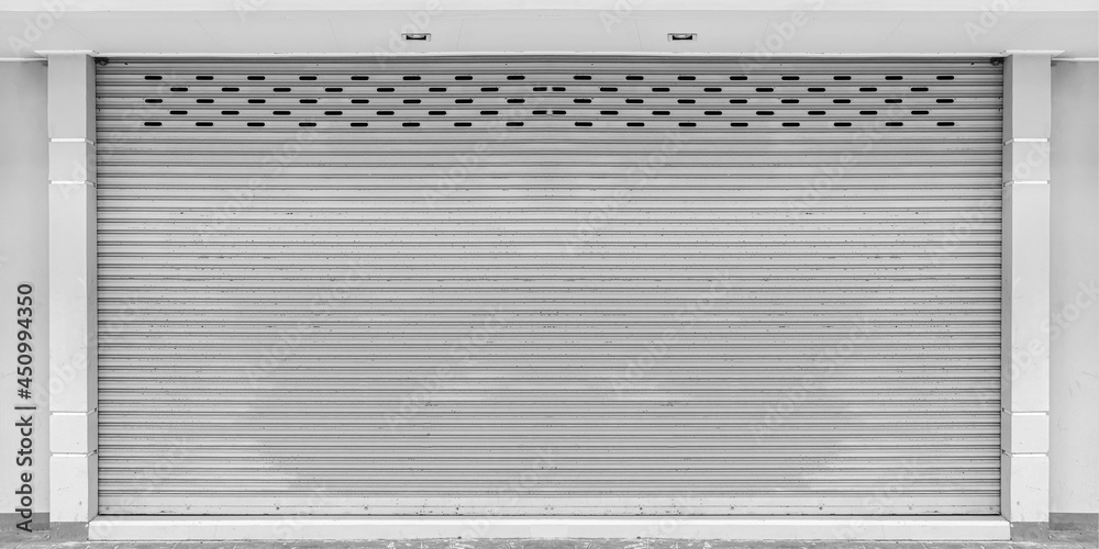 Steel shutter door of warehouse, storage or storefront for metal door ...