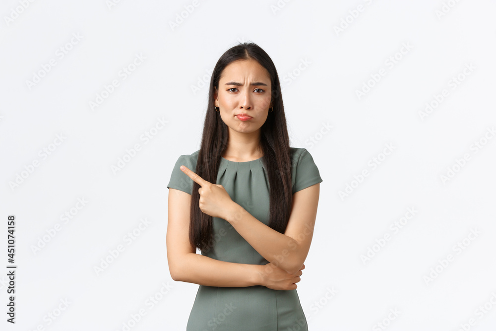 Small business owners, women entrepreneurs concept. Skeptical and ...