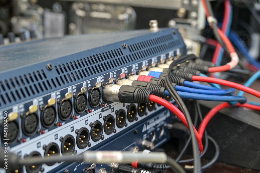Sound cables connected in a mixing console at the soundcheck for an ...