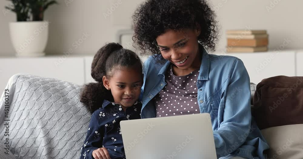 Happy bonding two female generations african ethnicity family using ...