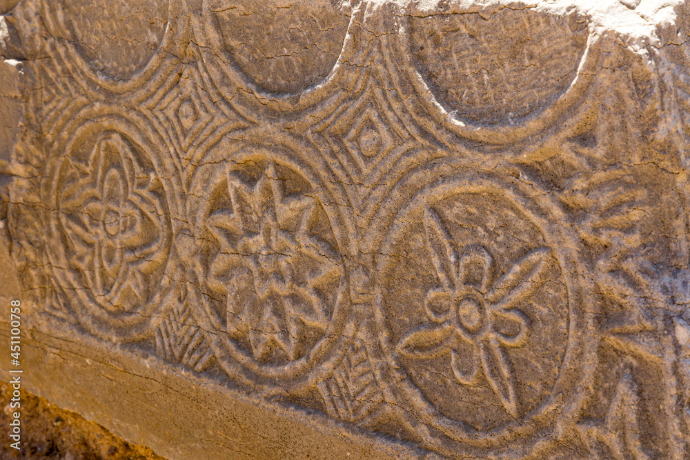 Ancient inscriptions on a stone slab at the ruins of Itanos on Crete ...