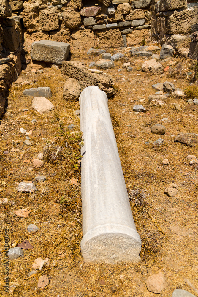 Fallen stone columns and pillars at the ruins of the ancient city of ...