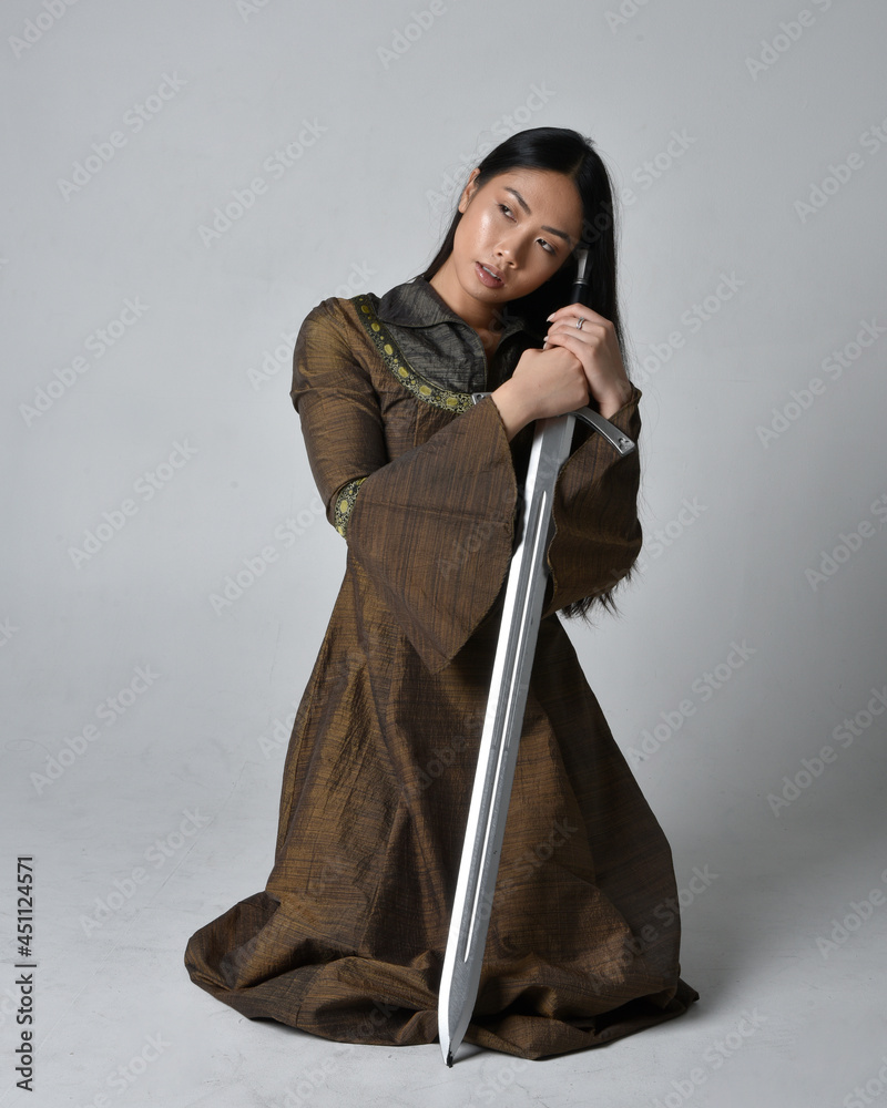 Full Length Portrait Of Beautiful Young Asian Woman With Long Hair