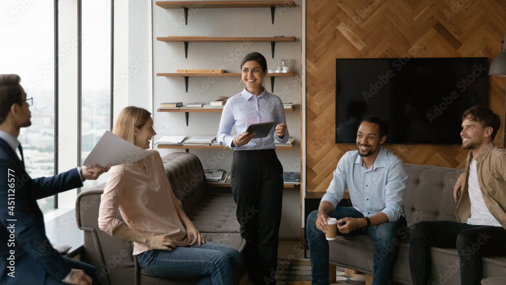 Five cheerful successful businesspeople group of colleagues gathered ...