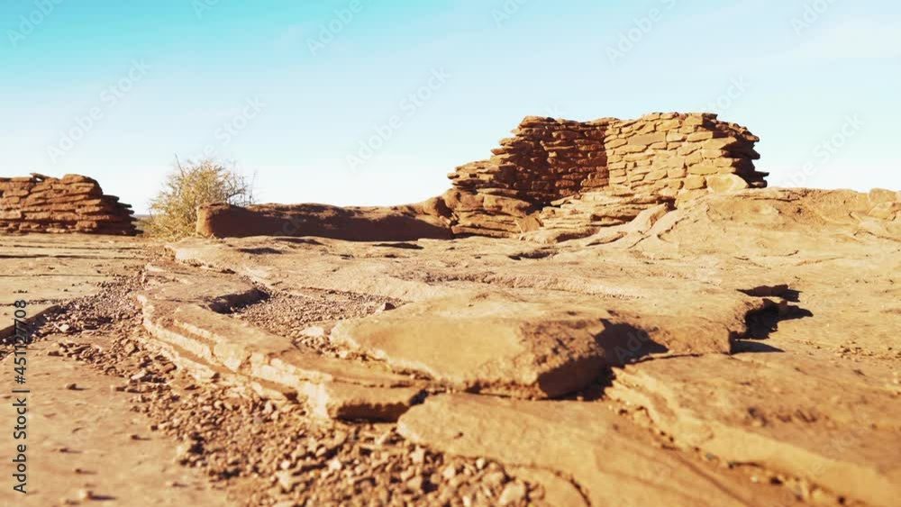 Abandoned ruins in the desert. Trucking shot with ruined building ...