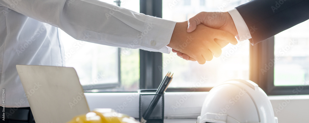 engineer handshake after successful contract and success deal ...