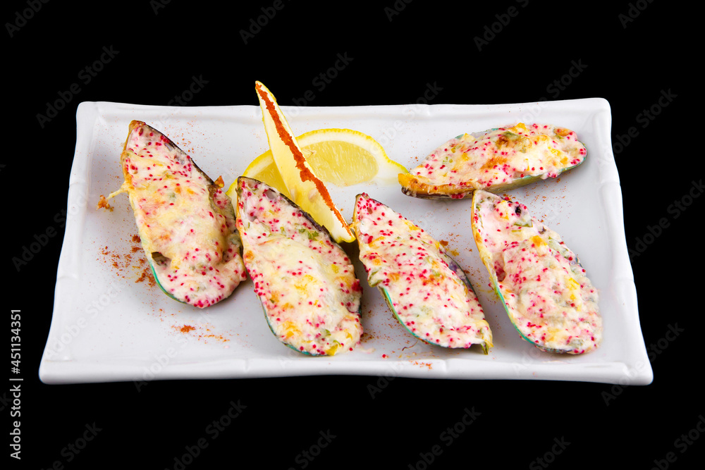 Kiwi mussels, also known as green New Zealand mussels, baked with ...