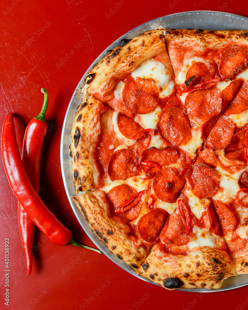 Hot Chilli Pepperoni Pizza, ready to eat. Whole sliced pepperoni salami ...